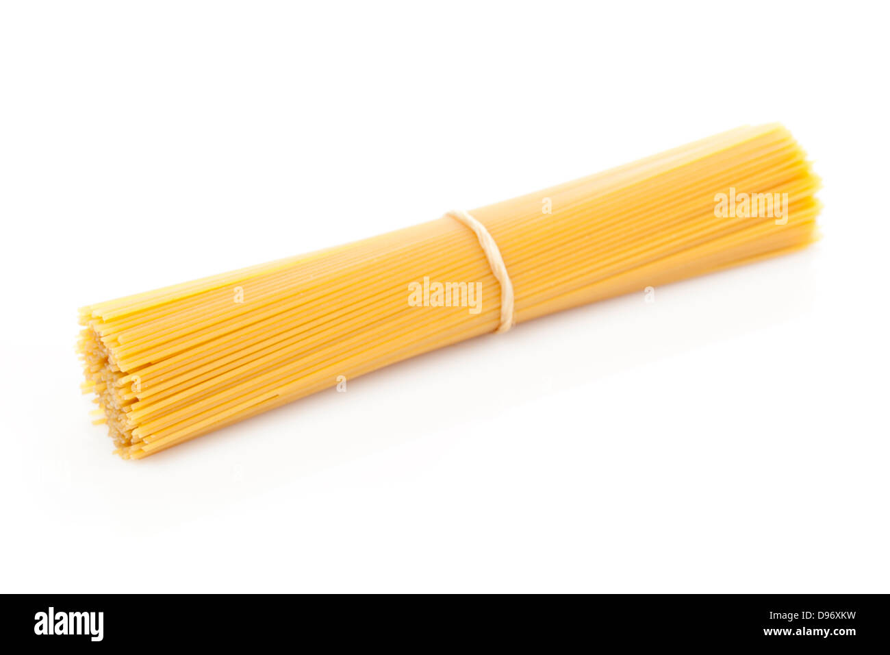 A Bundle of dry spaghetti ready to cook Stock Photo - Alamy