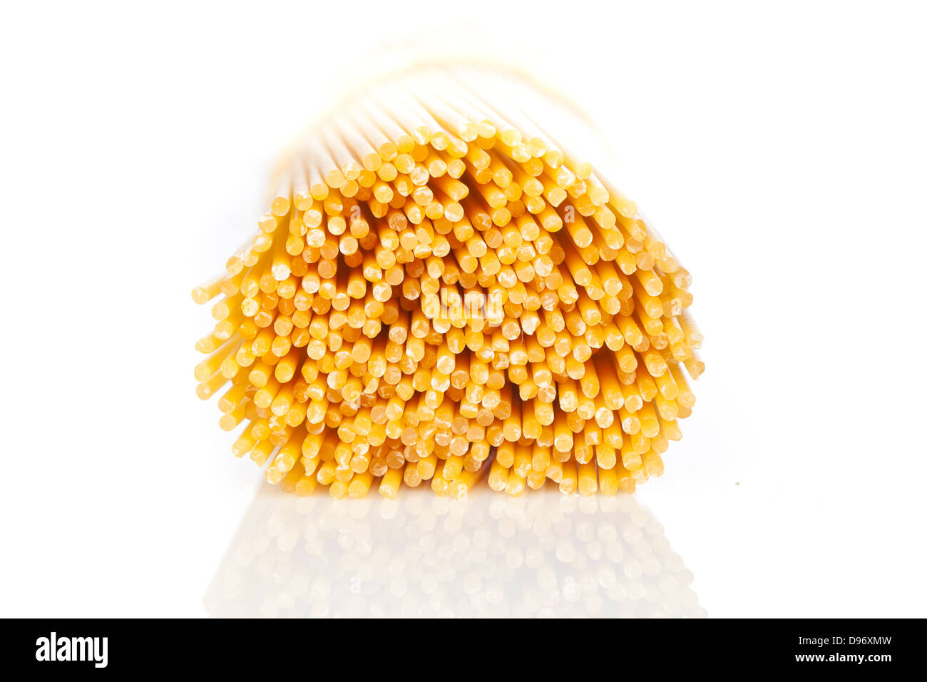 A Bundle of dry spaghetti ready to cook Stock Photo - Alamy