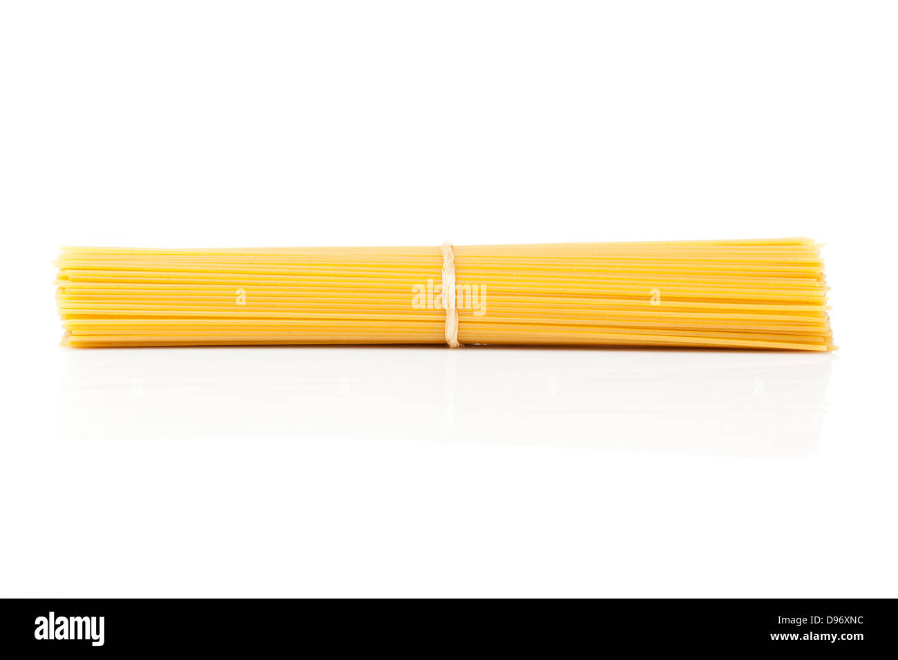 A Bundle of dry spaghetti ready to cook Stock Photo - Alamy