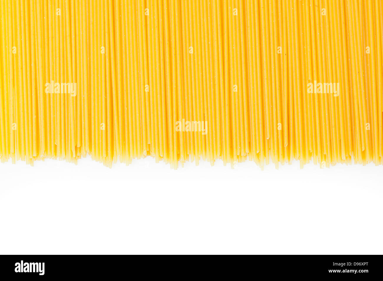 A Bundle of dry spaghetti ready to cook Stock Photo - Alamy