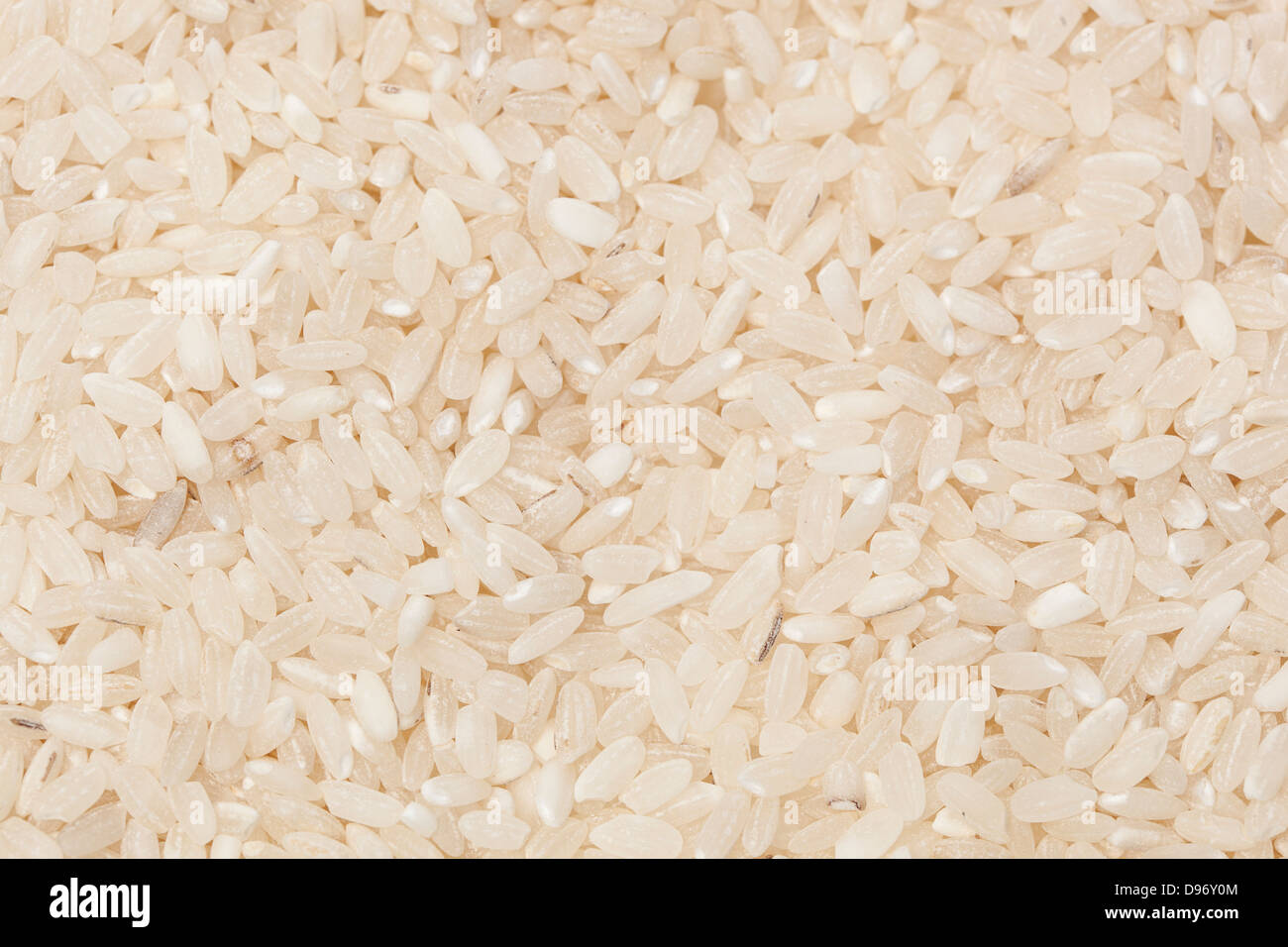 A heap of Healthy Dry Brown Rice ready to cook Stock Photo - Alamy