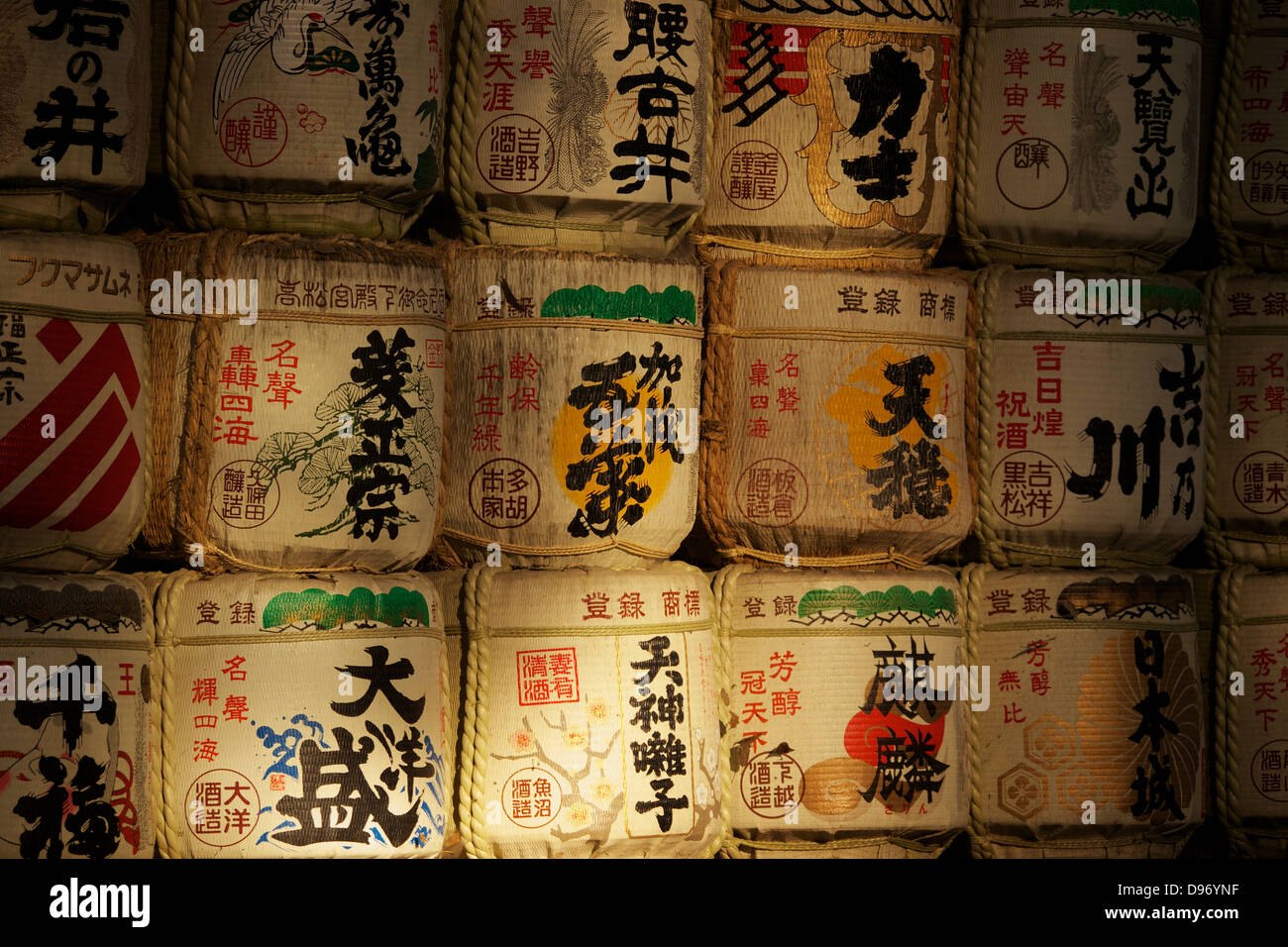 Donated Sake Barrels at Meiji Shrine, Tokyo, in evening golden glow ...