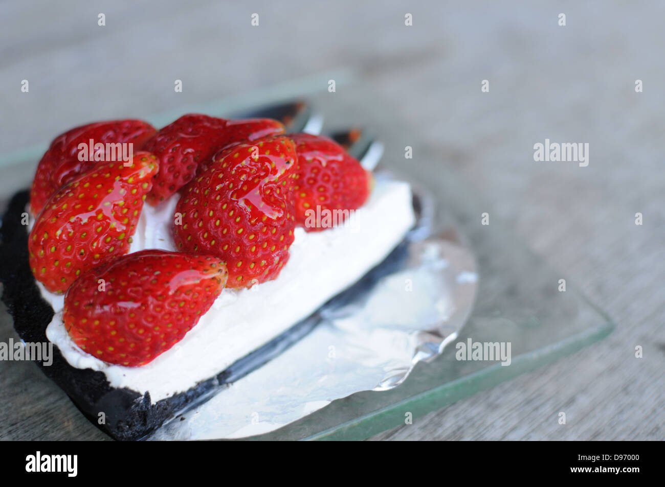 Strawberry cake on Glass Plate Stock Photo - Alamy