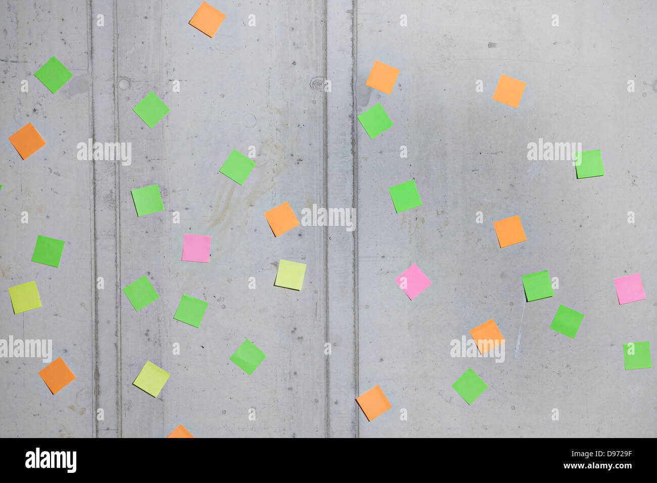 Germany, North Rhine Westphalia, Cologne, Adhesive notes stuck on wall ...