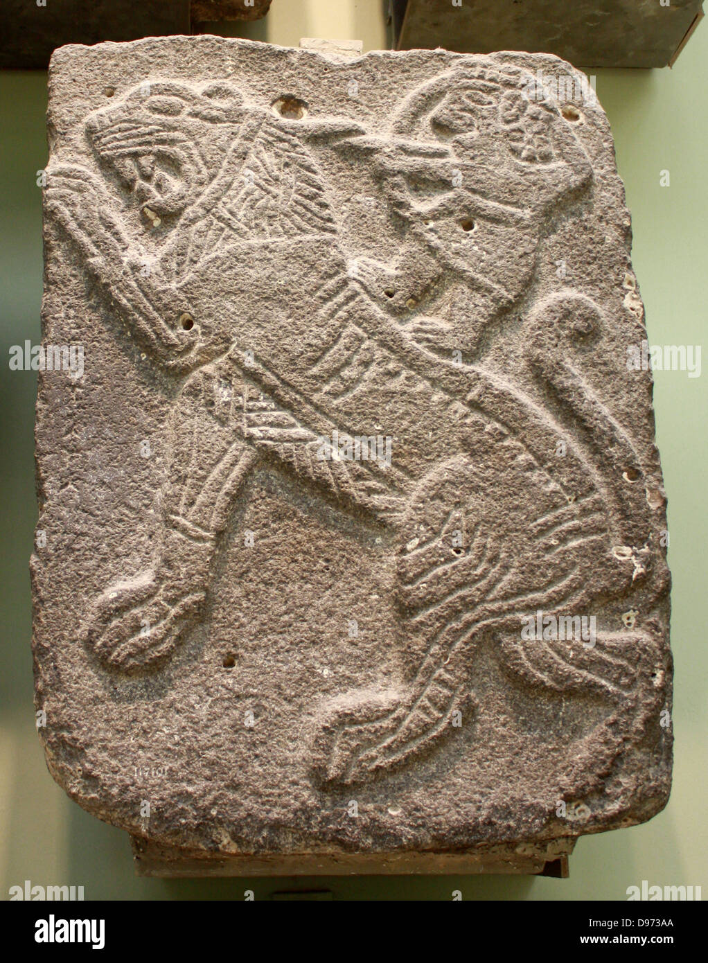 Reliefs from Tell Halaf. The cuneiform inscription seen on the reliefs ...