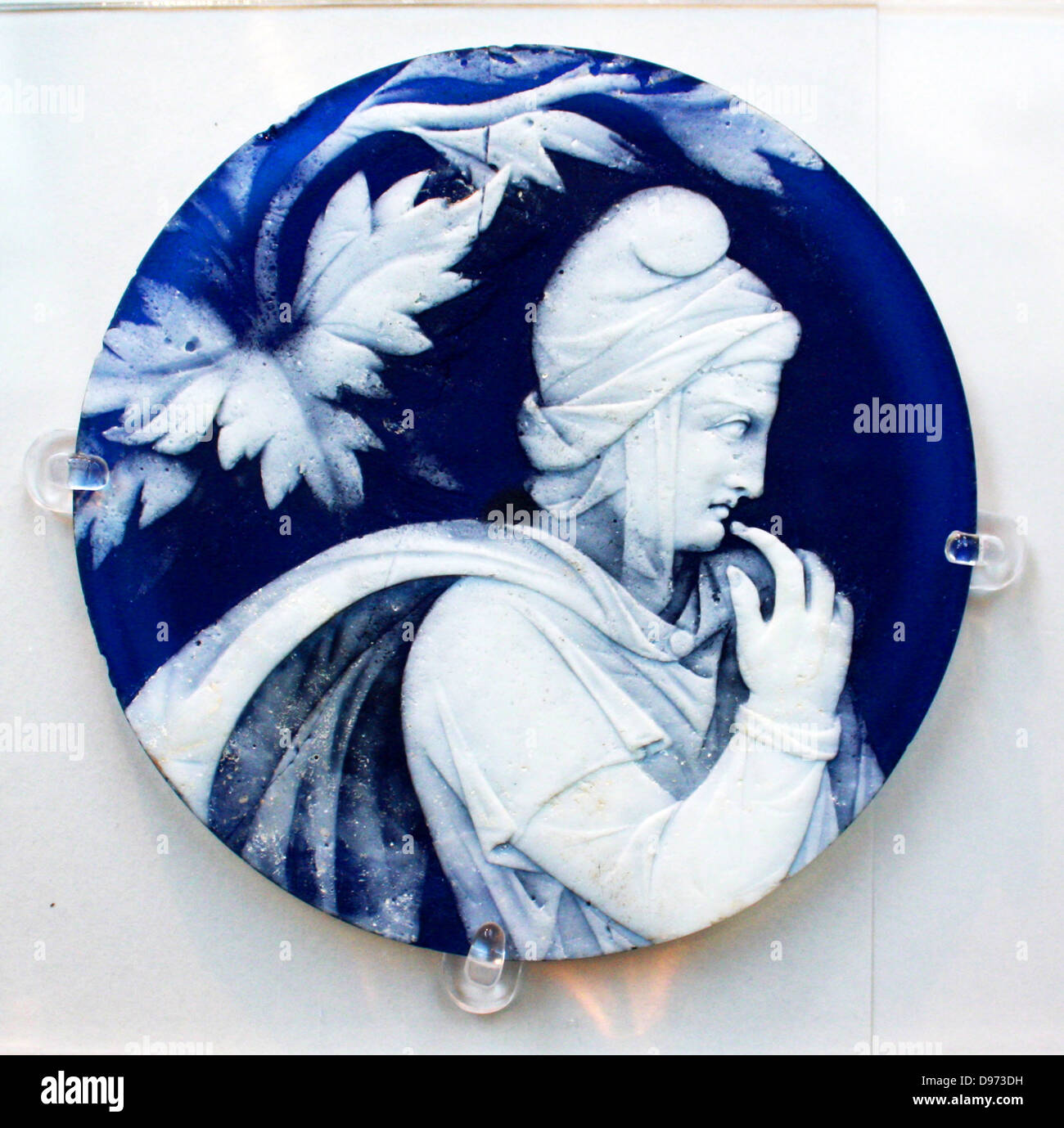 Cameo glass disc with the head of a young man. Cameo glass, probably ...