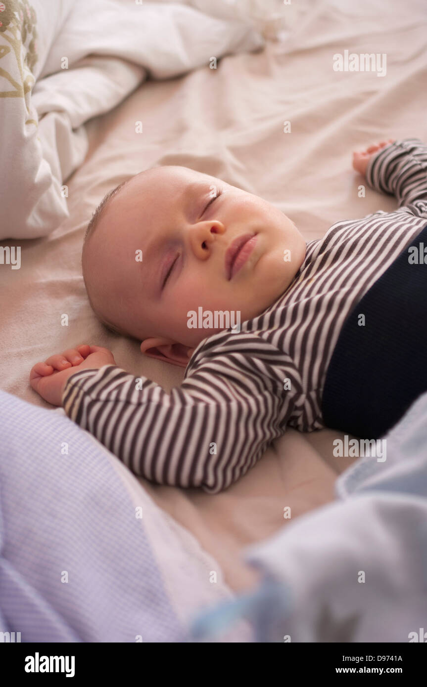 Baby boys sleeping on blanket hi-res stock photography and images - Alamy
