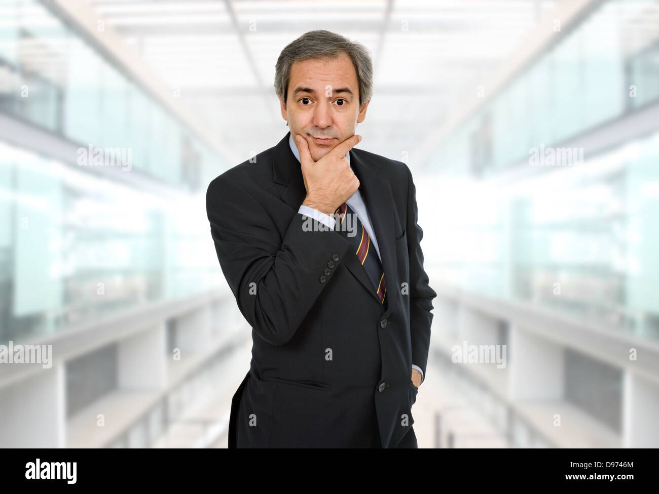 mature business man thinking at the office Stock Photo - Alamy