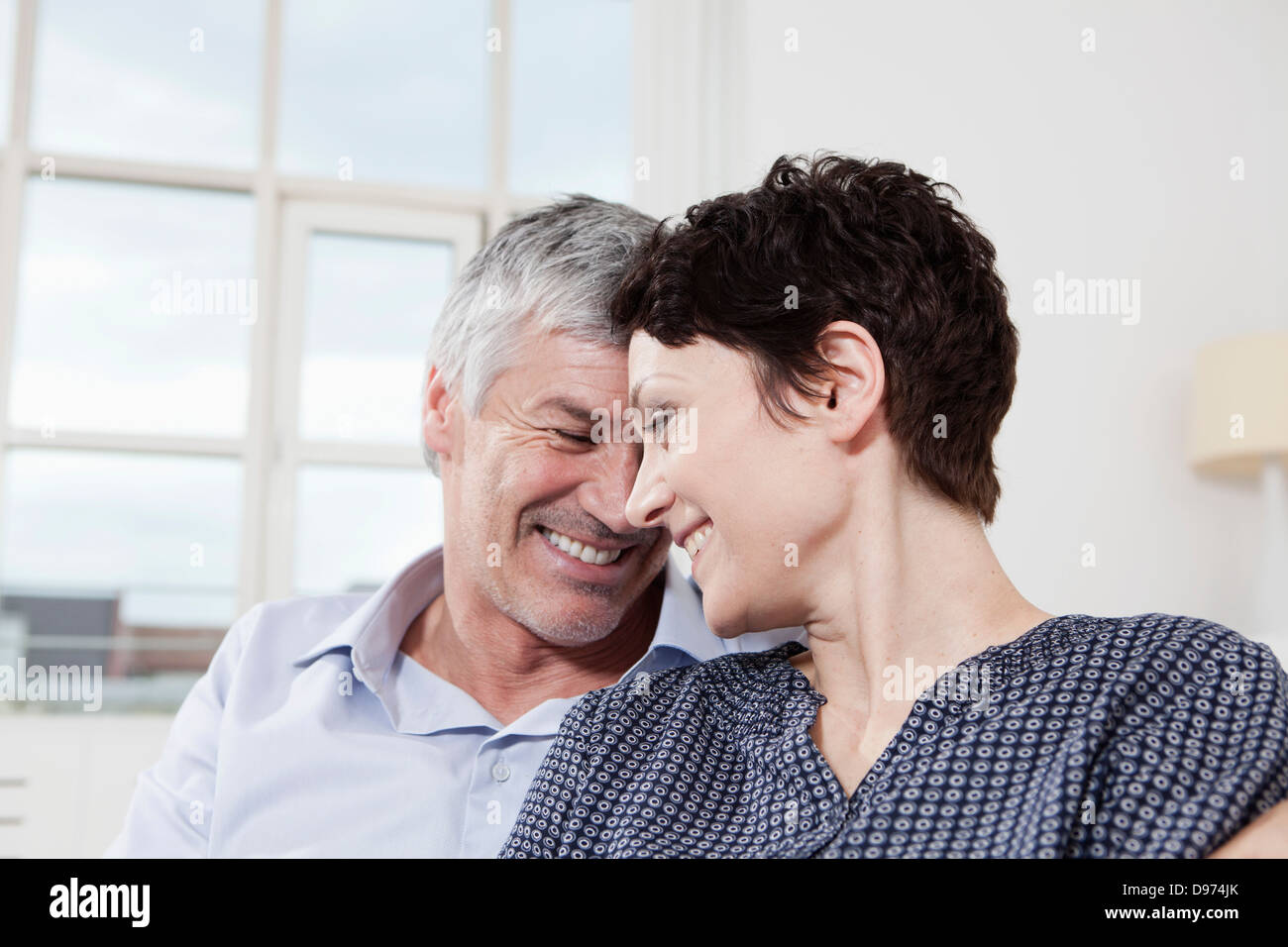 Germany, Bavaria, Munich, Couple falling in love, smiling Stock Photo ...