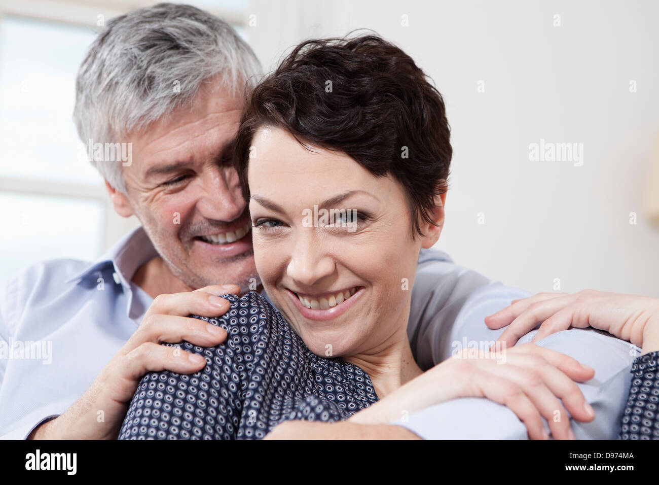Germany, Bavaria, Munich, Couple falling in love, smiling Stock Photo ...