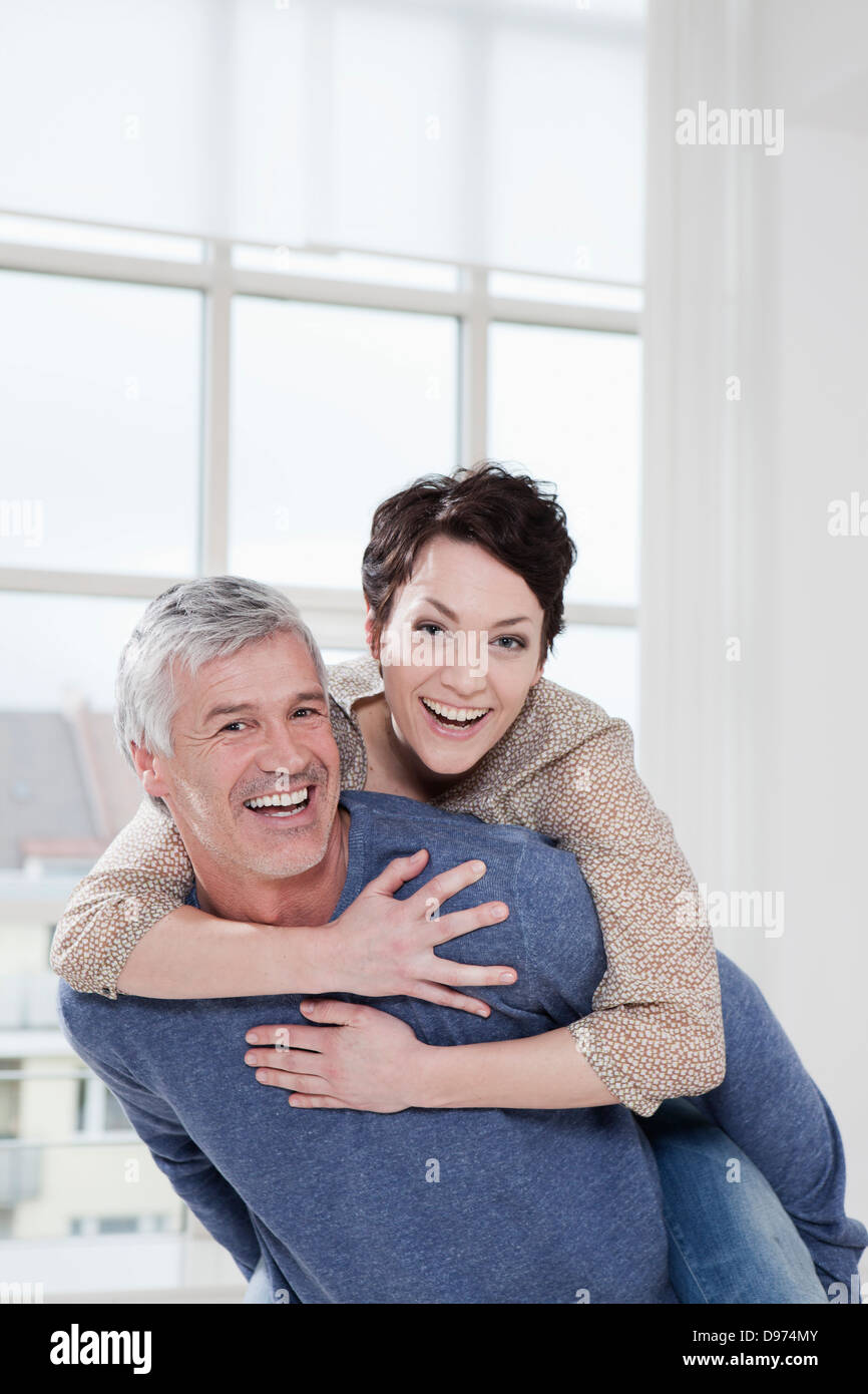 Piggy back ride adults hi-res stock photography and images - Alamy