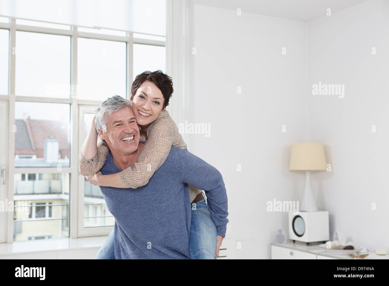 Piggy back ride adults hi-res stock photography and images - Alamy