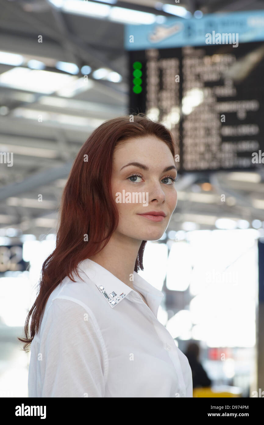 Germany, Cologne, Young woman looking away Stock Photo - Alamy