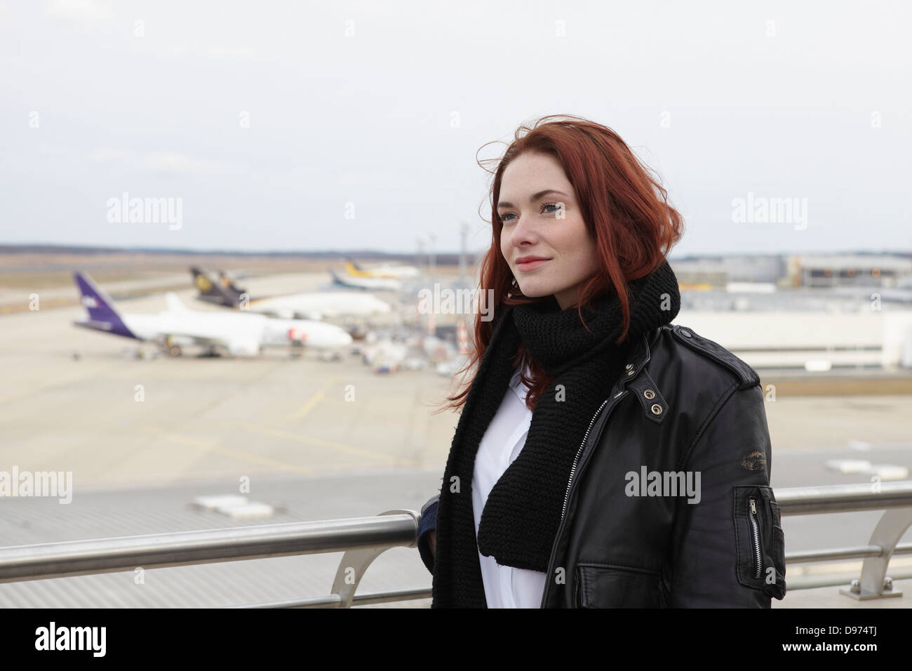 Germany, Cologne, Young woman at airport Stock Photo - Alamy