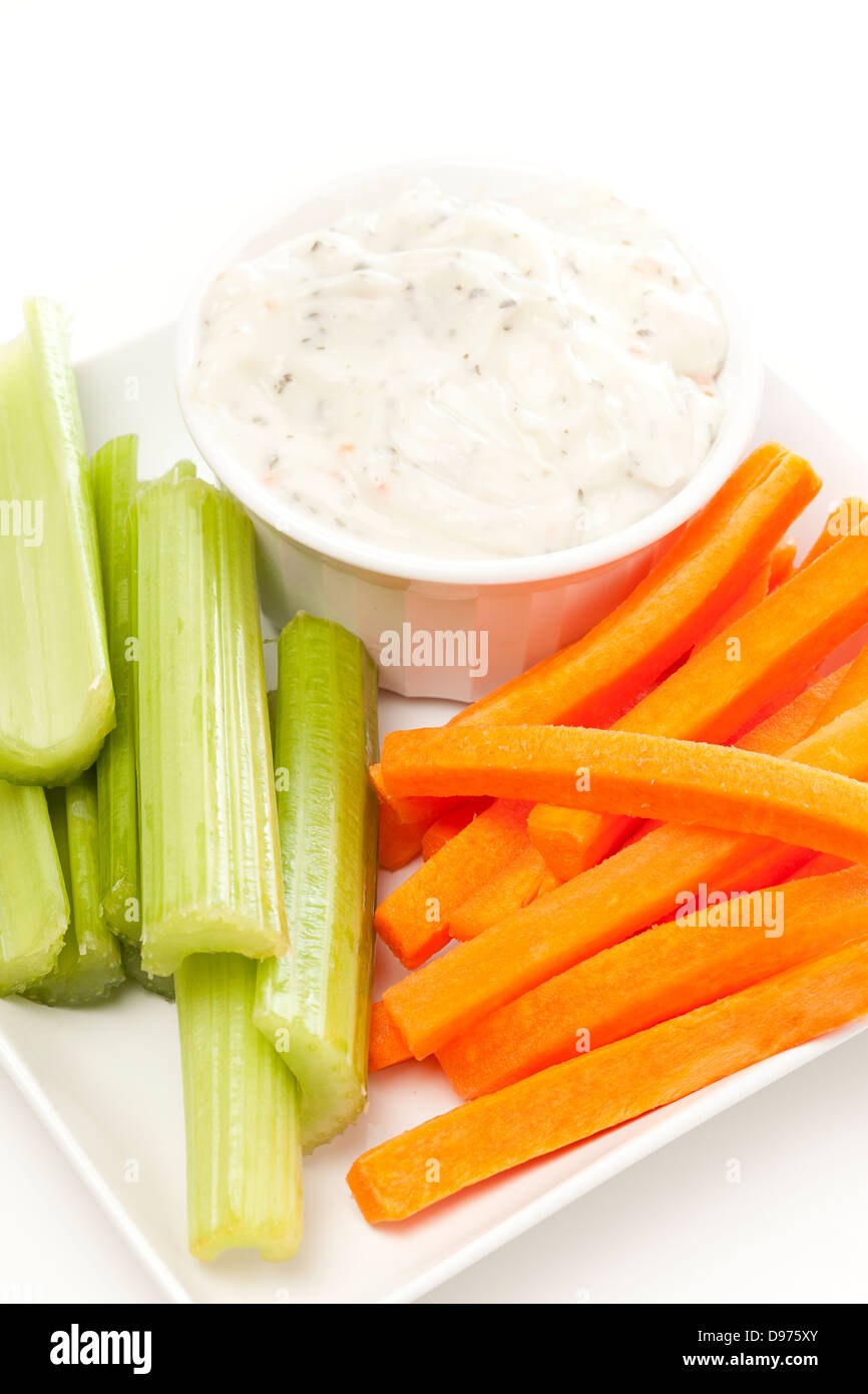 Ranch dressing with fresh carrots and celery Stock Photo - Alamy