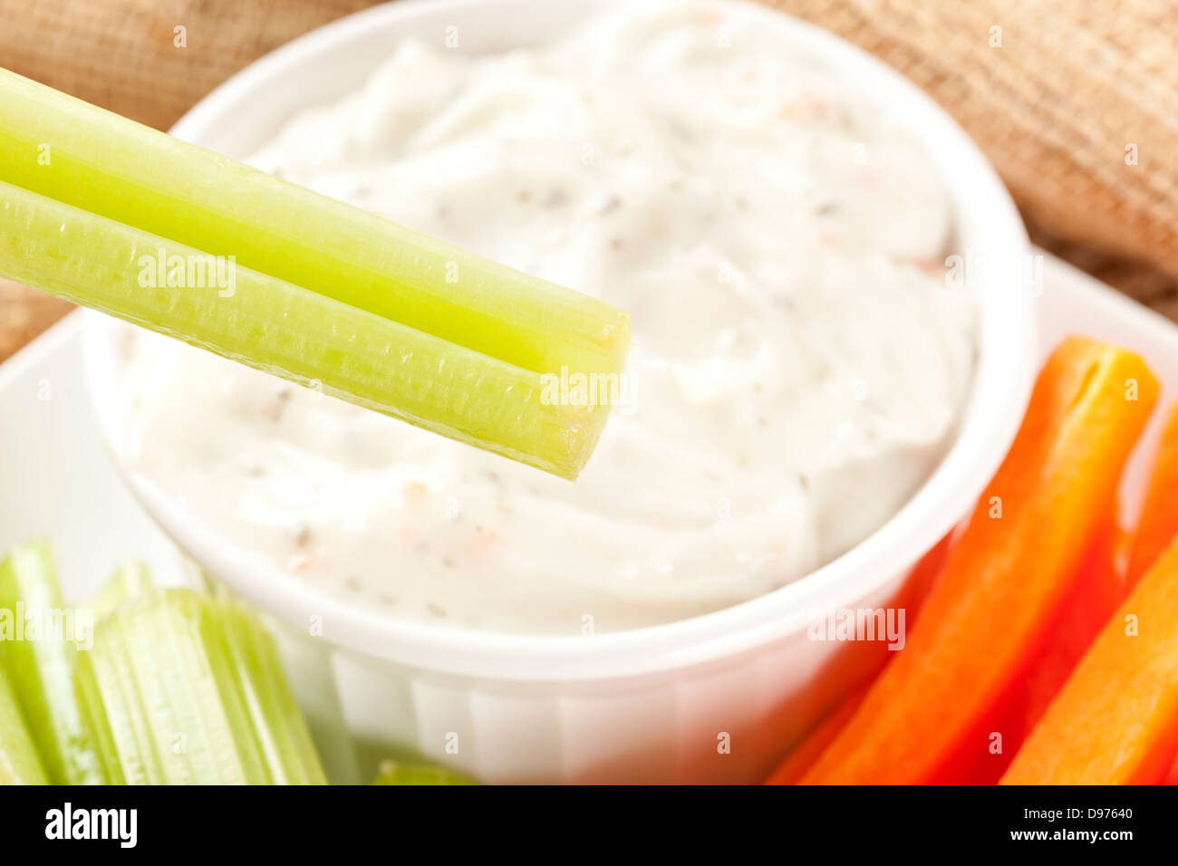 Organic Crunchy Celery and ranch dip on a background Stock Photo - Alamy