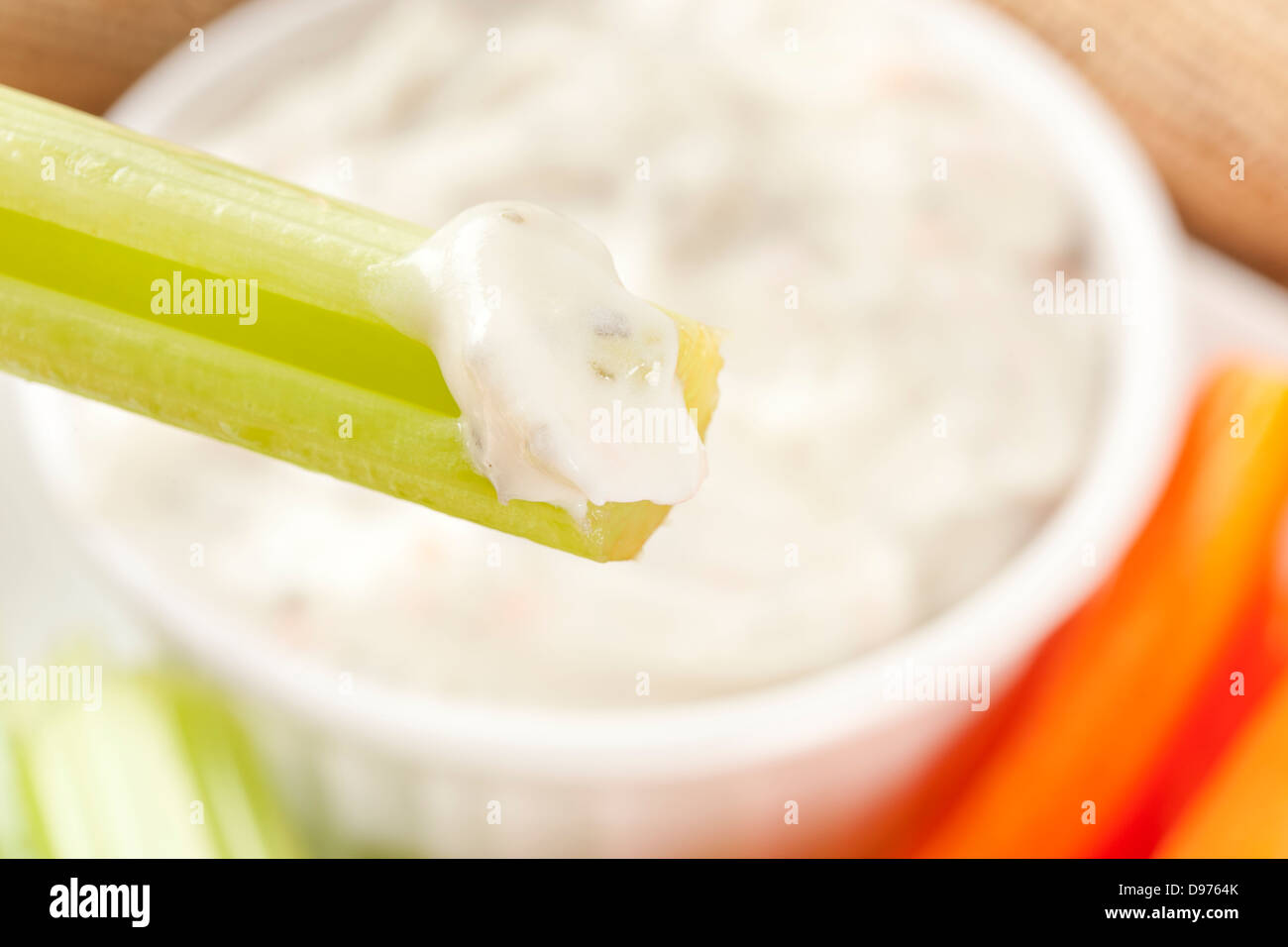 Organic Crunchy Celery and ranch dip on a background Stock Photo - Alamy
