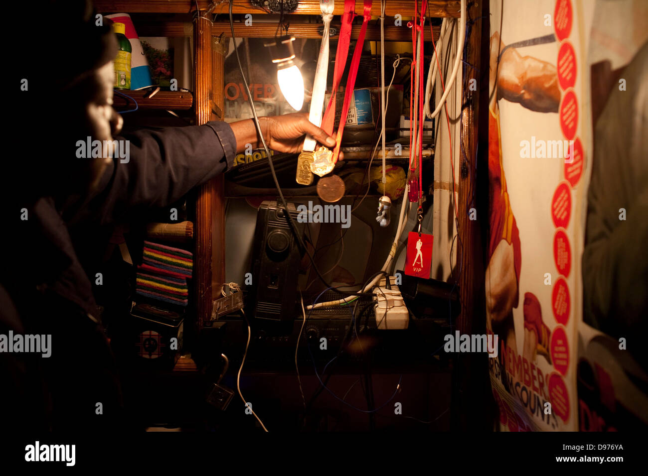 Godfrey 25 proudly shows off football medals brother won He has been ...