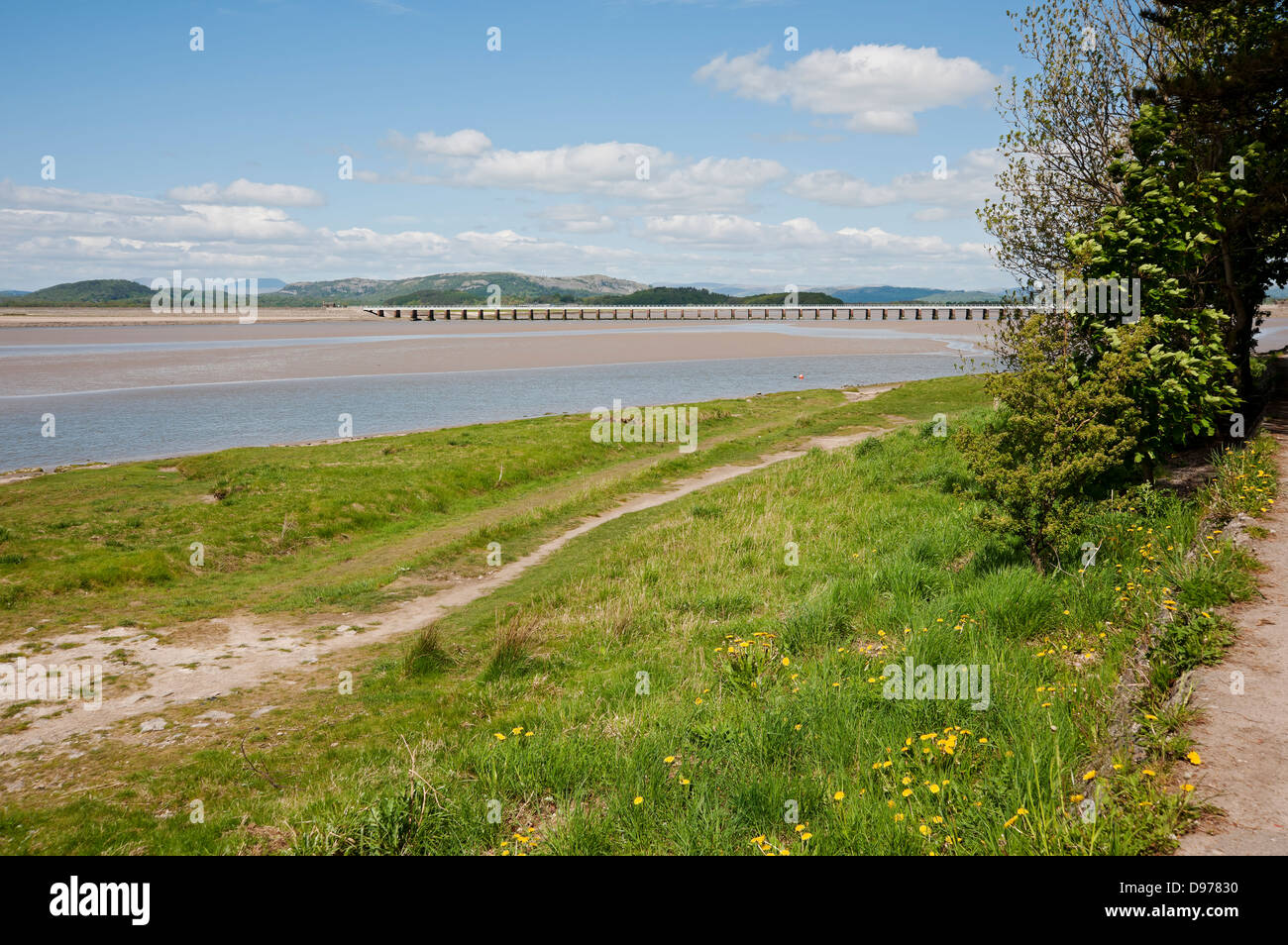 Looking across the Kent Estuary towards Arnside railway bridge viaduct ...