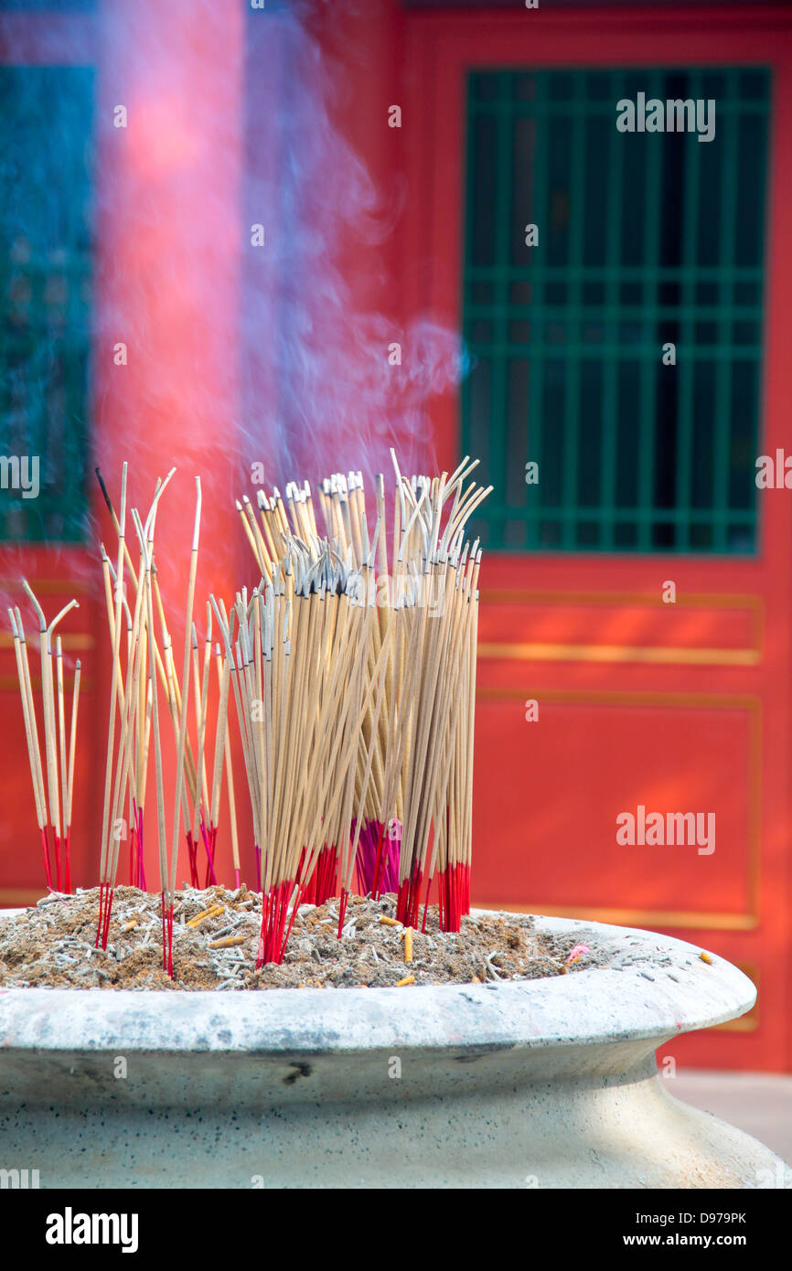 Incense furnace and smoking joss stick. Concept of chinese offering ...