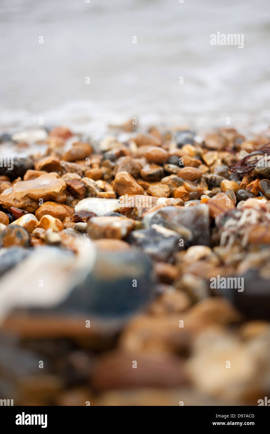 Wet pebbles at high tide hi-res stock photography and images - Alamy