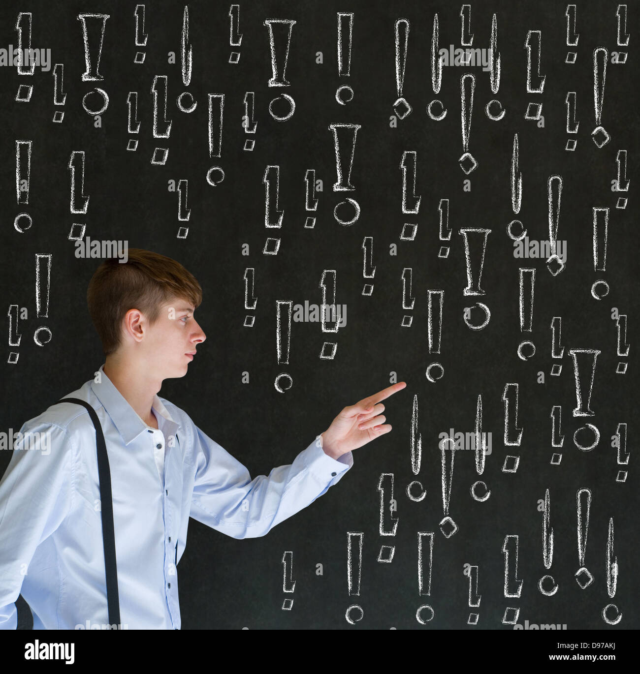 Thinking business man with chalk exclamation marks on blackboard ...