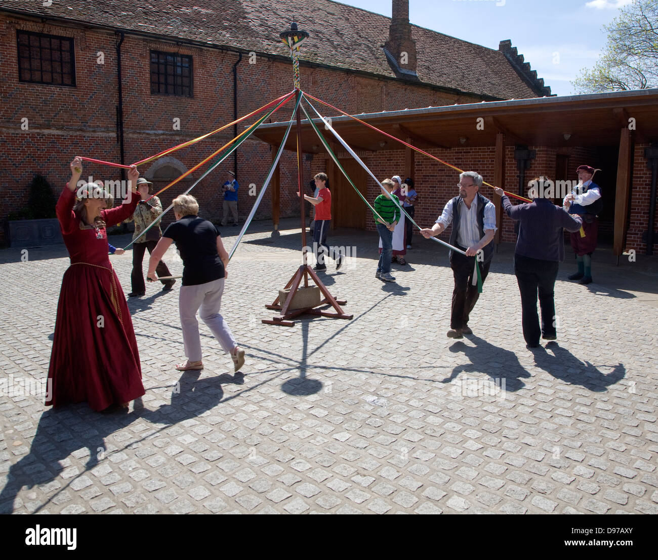 People maypole dancing during Tudor history re-enactment day, Layer ...