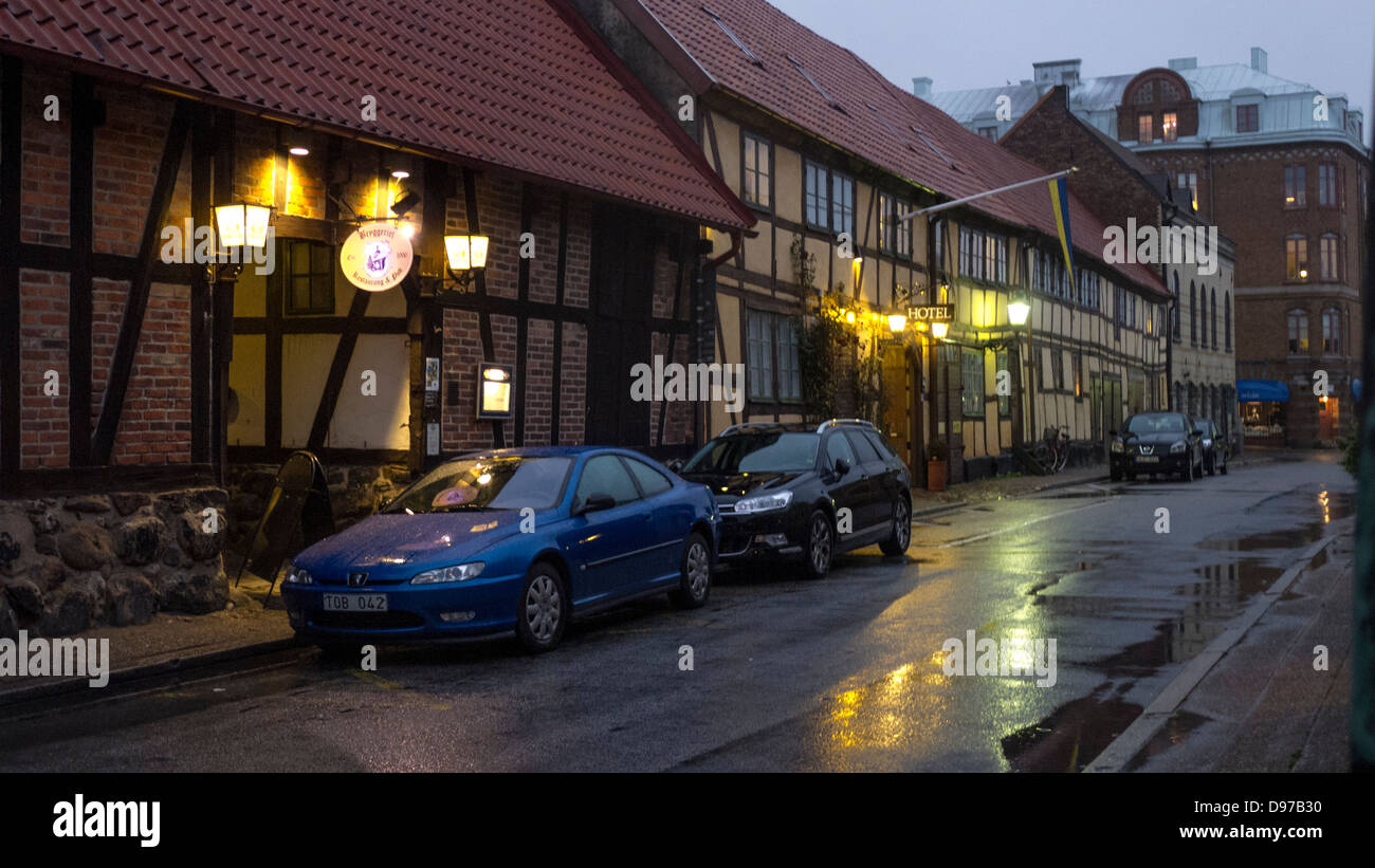 Nighttime in a typical street in the small town of Ystad in south ...