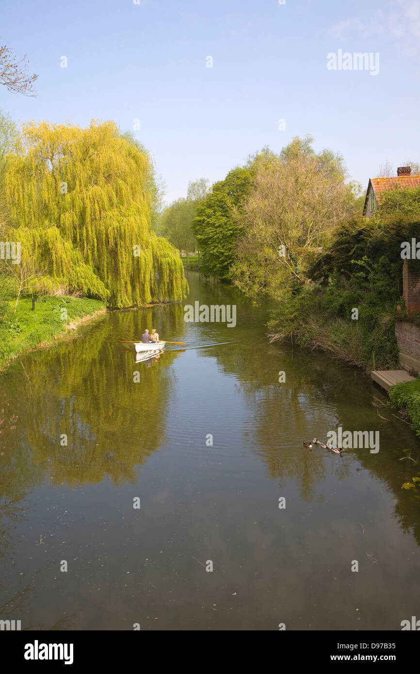 Rowing boat on the River Stour at Bures, Suffolk Essex border, England ...
