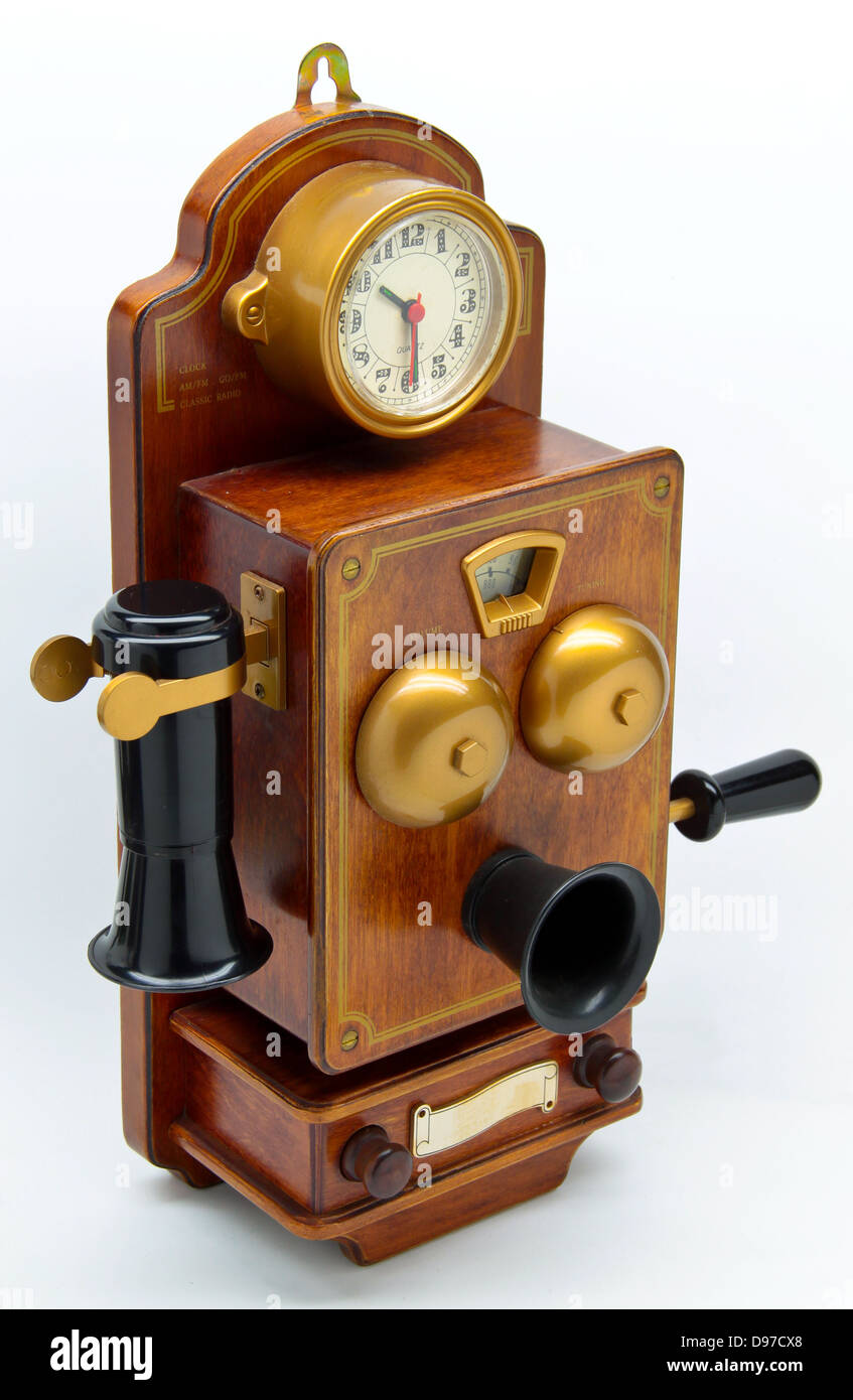 Antique phone with clock isolated on white Stock Photo - Alamy