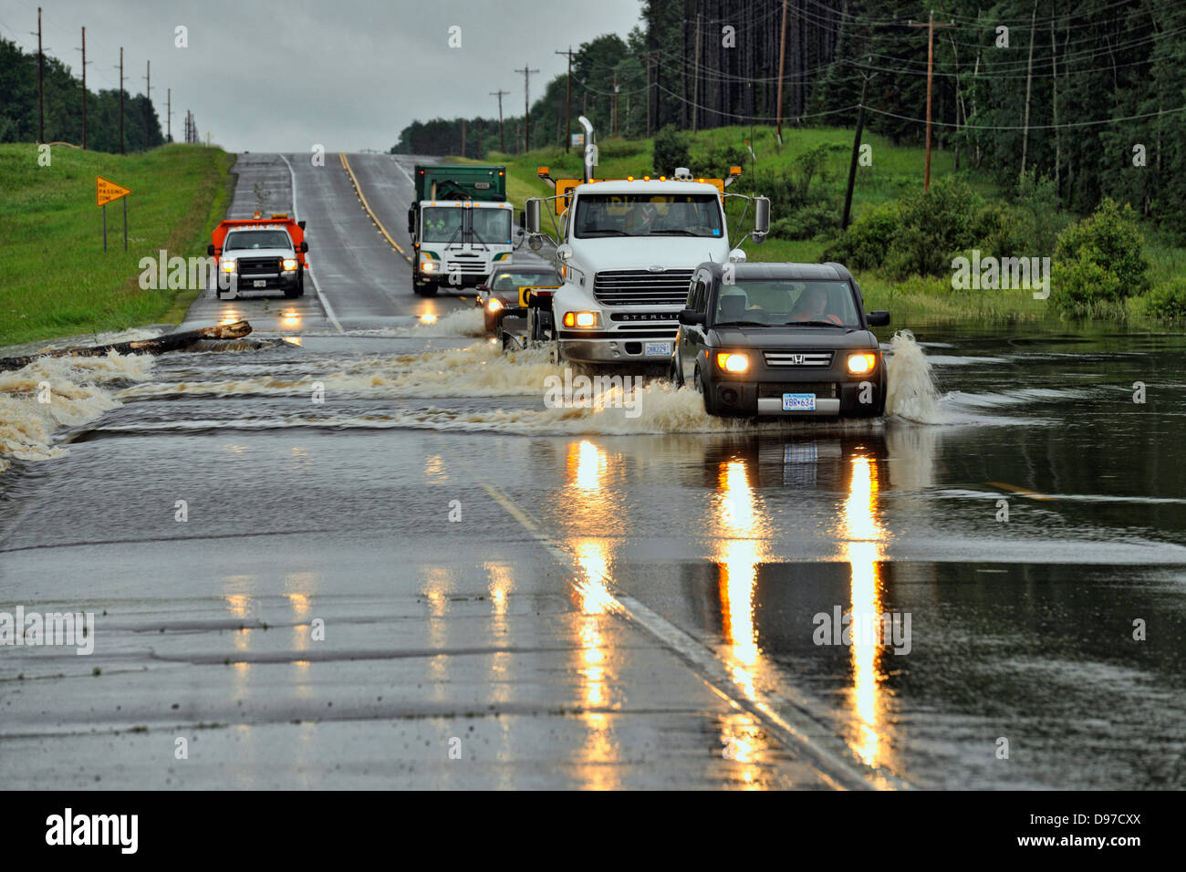 Highway 2 traffic negotiating flooded road Duluth Minnesota USA Stock ...