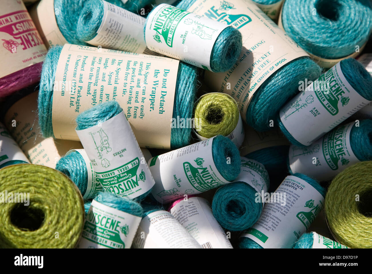 Close up wrapped bundles of garden twine Stock Photo - Alamy
