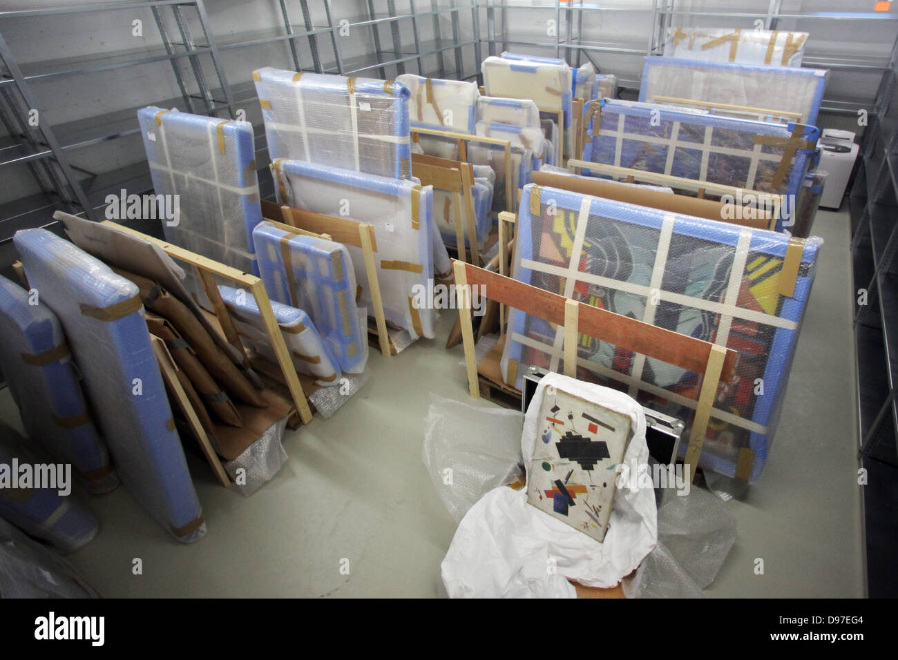 Confiscated paintings sit in a room in the basement of the Federal ...