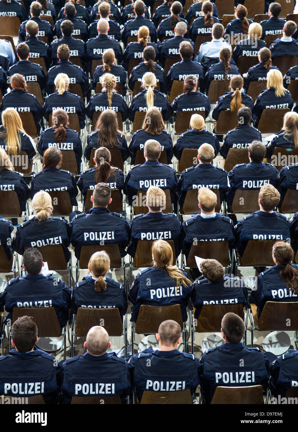 Male police officer sitting in hi-res stock photography and images - Alamy