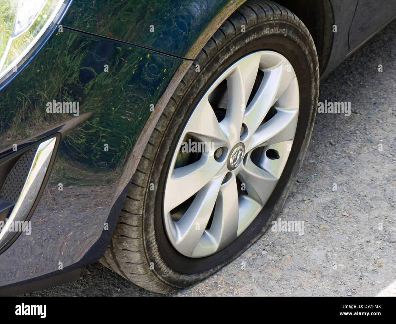 Punctured Tyre Wheel Stock Photos & Punctured Tyre Wheel Stock Images ...