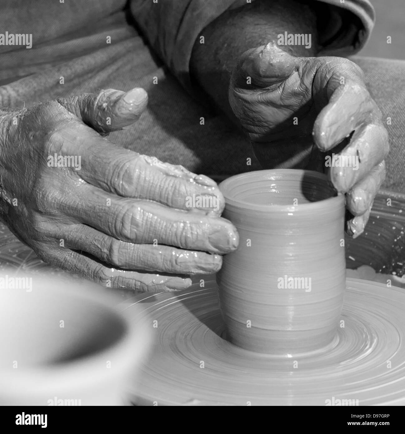 Hands forming a circle or chain Black and White Stock Photos & Images ...