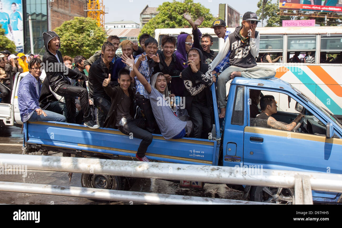 cheerful people riding on a car Stock Photo - Alamy
