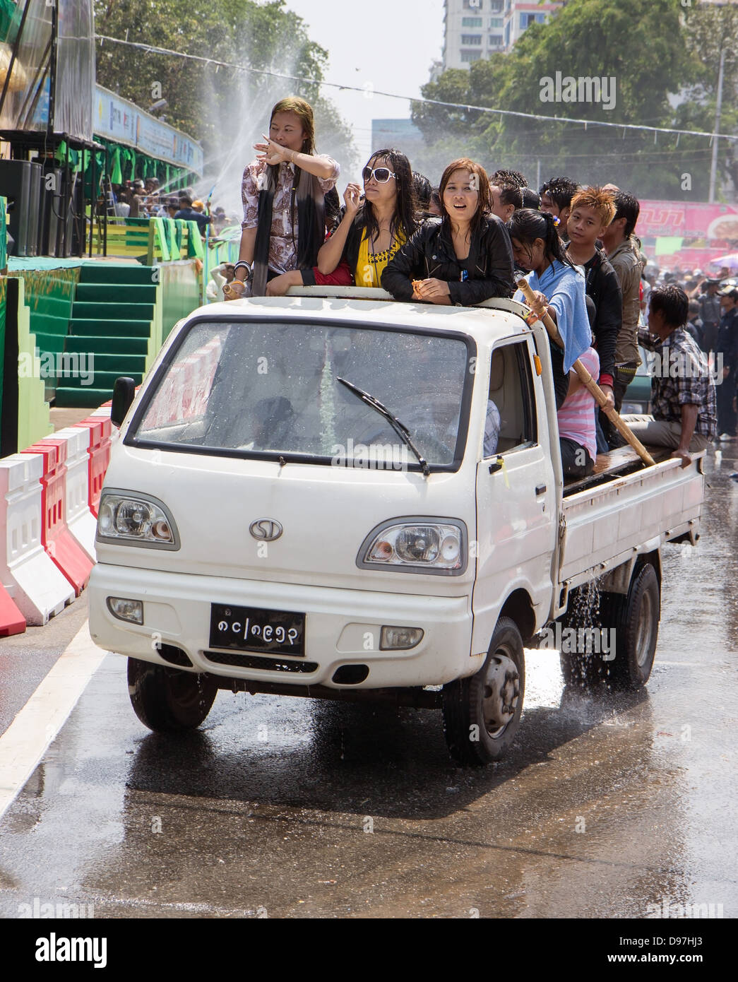 cheerful people riding on a car Stock Photo - Alamy
