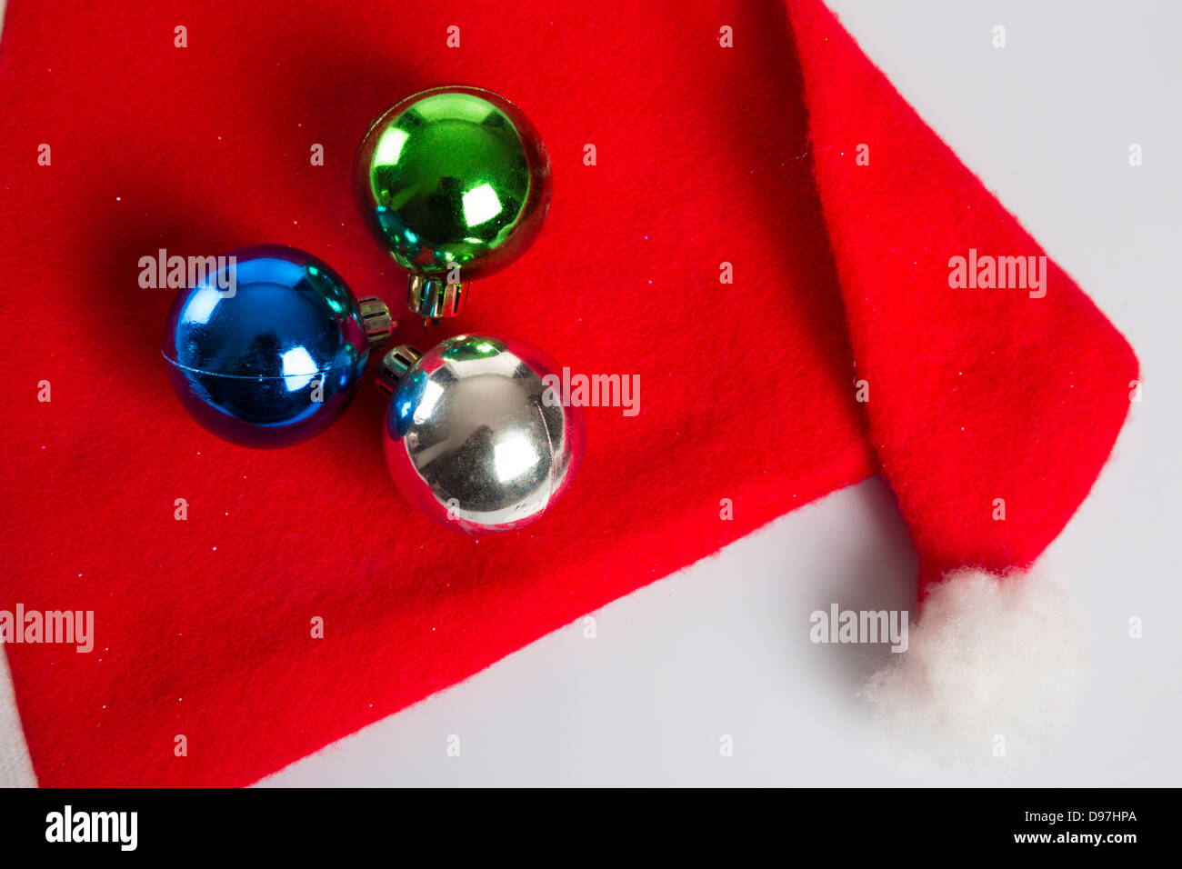 Santa hat and colorful baubles hi-res stock photography and images - Alamy