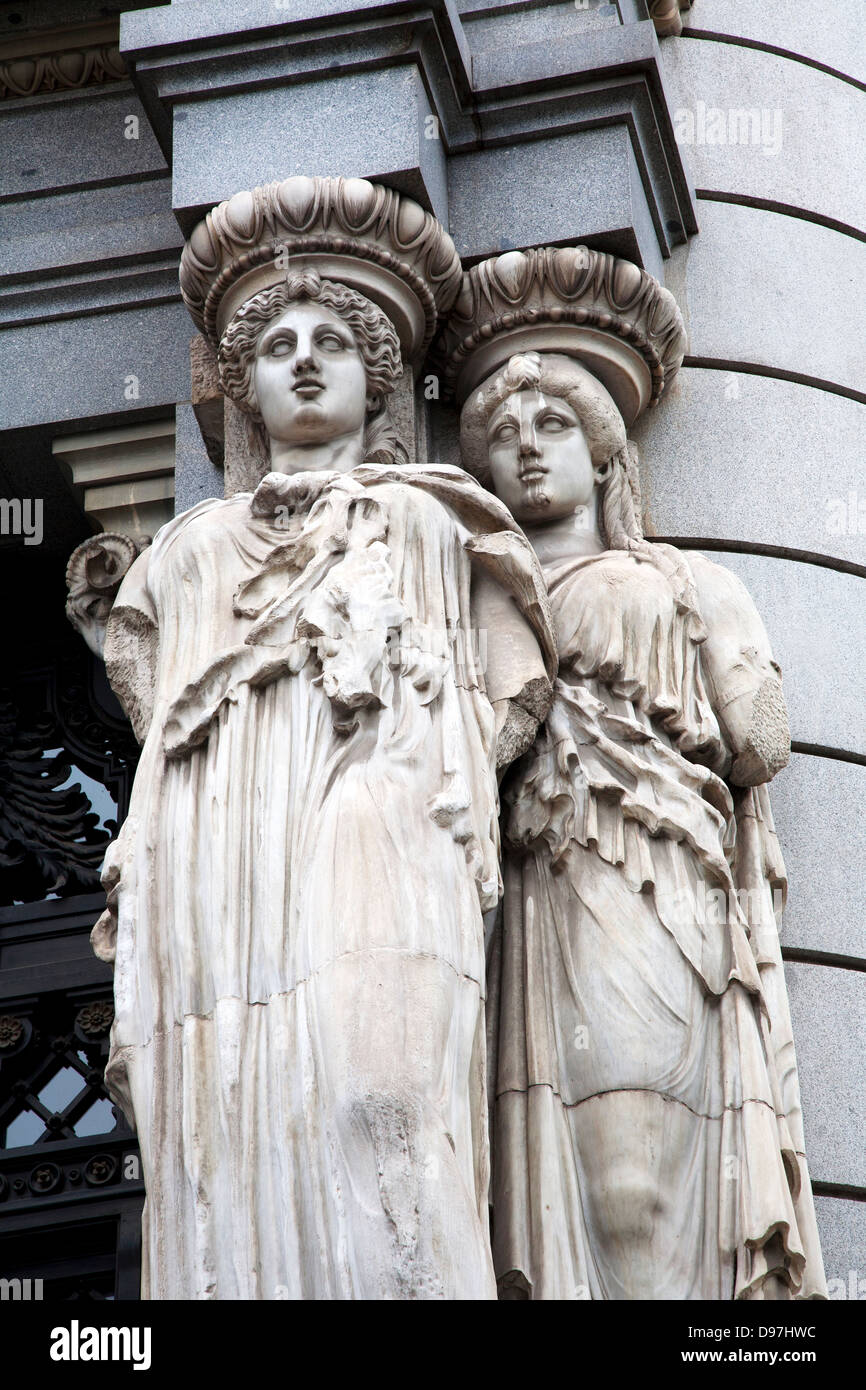 Detail of two classical figures, Madrid, Spain Stock Photo - Alamy