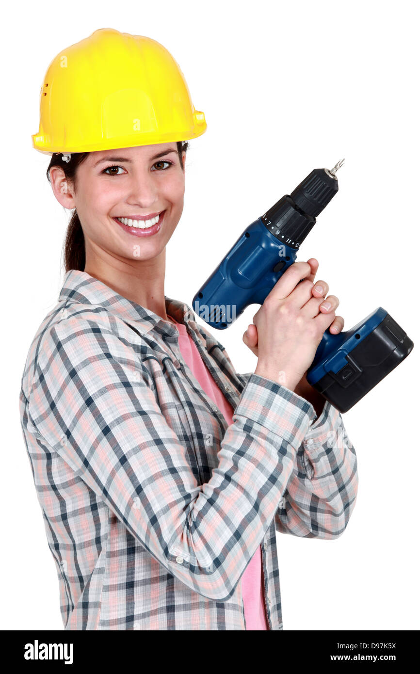 Woman holding a drill Stock Photo - Alamy