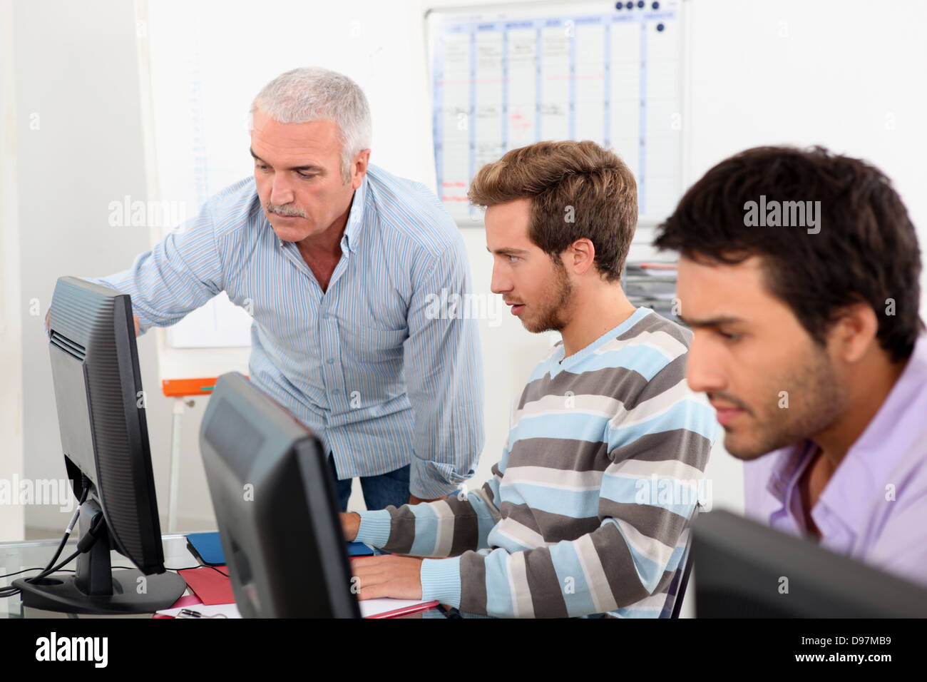 Using personal computers in classroom hi-res stock photography and ...