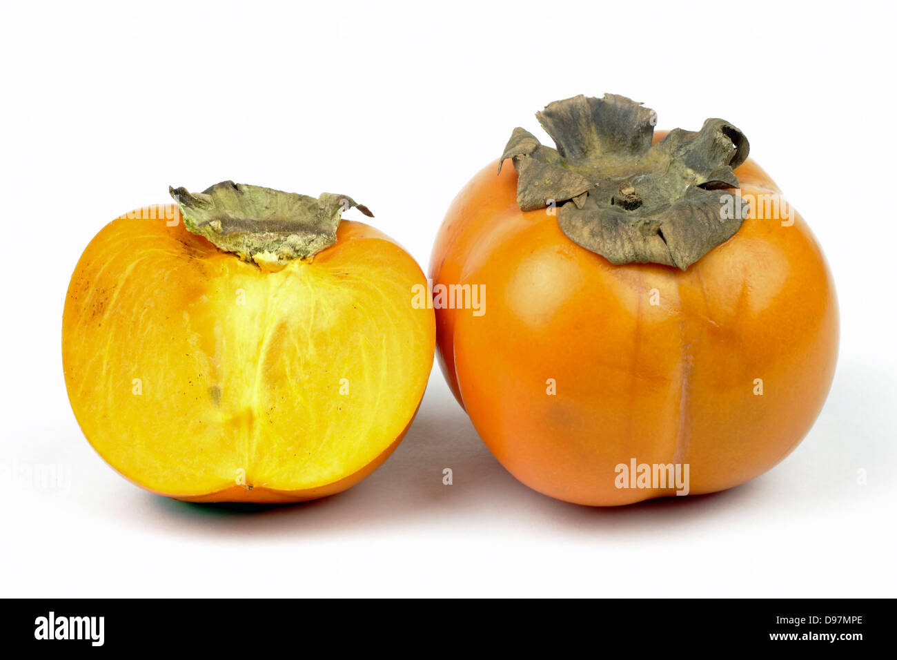 kaki sharon on the white background Stock Photo - Alamy