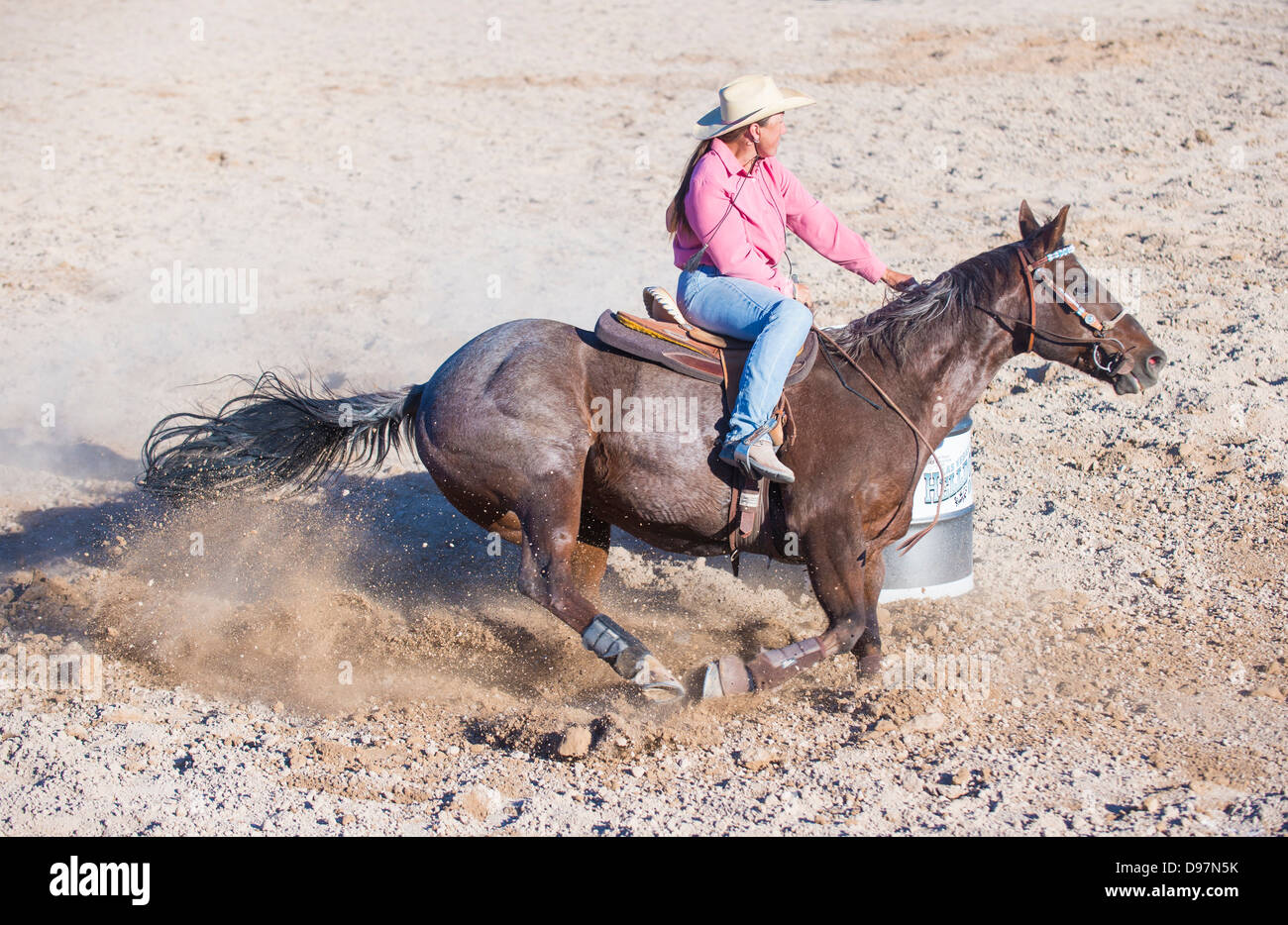 Cowgirl Participant in a Barrel racing competition at the Helldorado ...