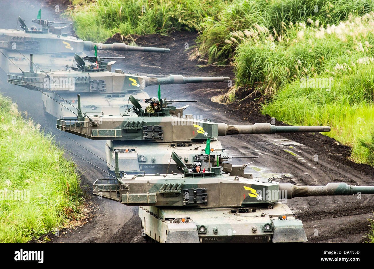 Japan Ground Self-Defense Forces (GSDF) take part in a live fire ...