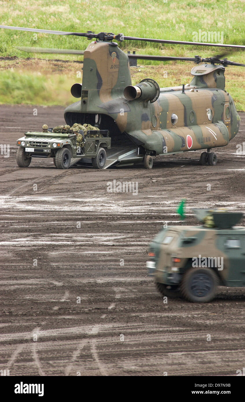 Japan Ground Self-Defense Forces (GSDF) take part in a live fire ...