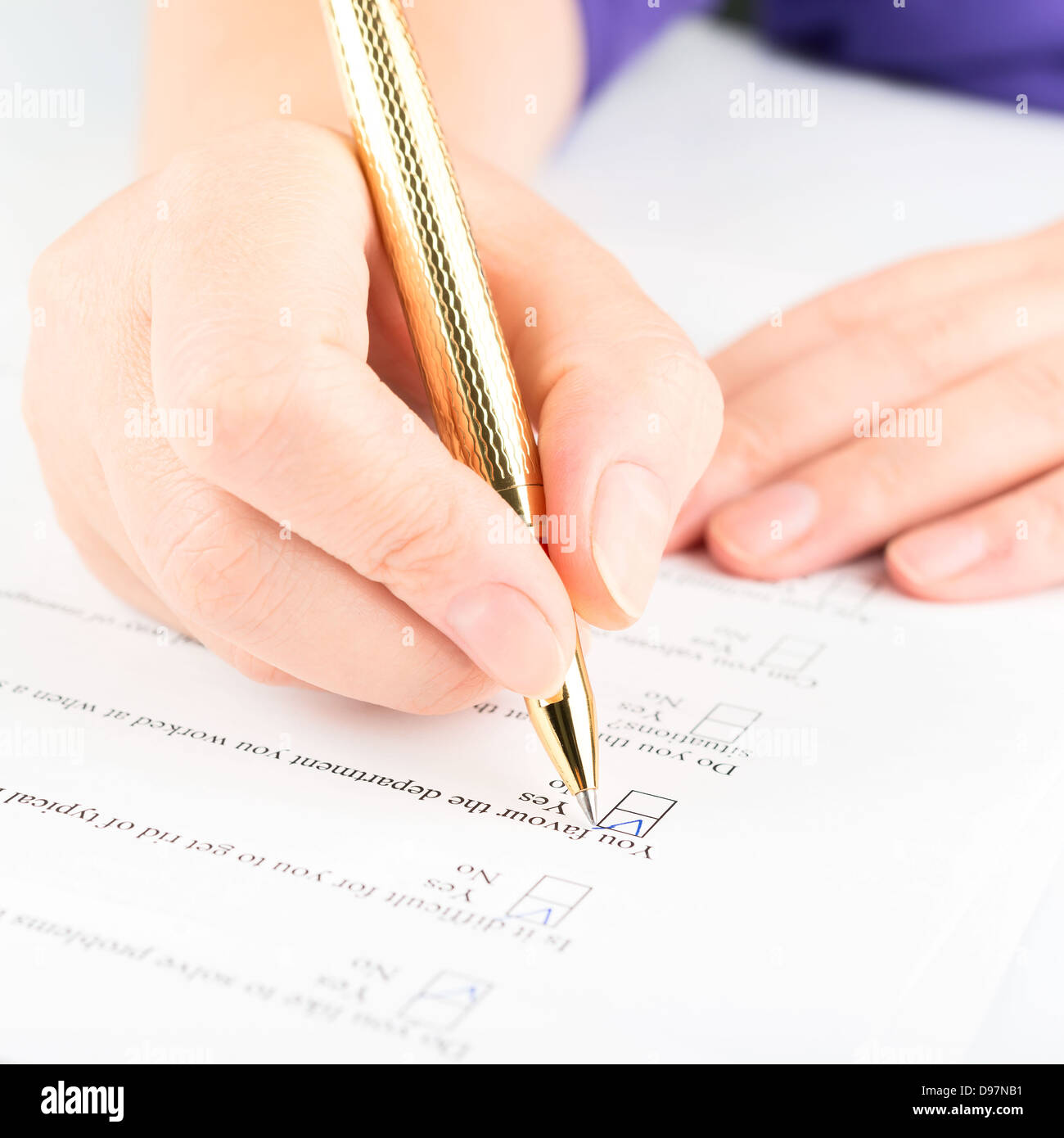 Filling of questionnaire by a ball point pen Stock Photo - Alamy