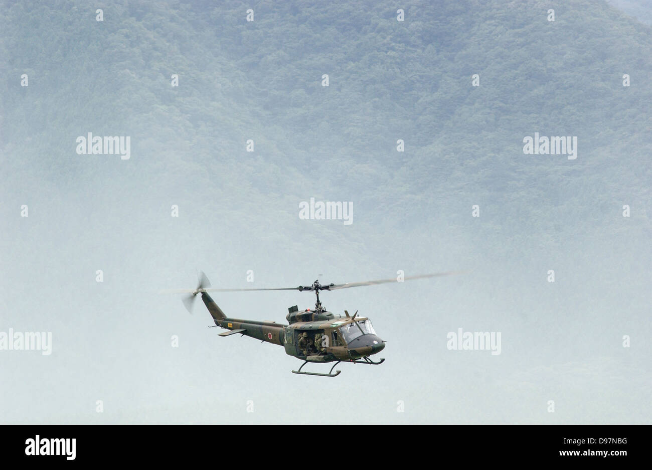 A helicopter of the Japan Ground Self-Defense Forces takes part in a ...