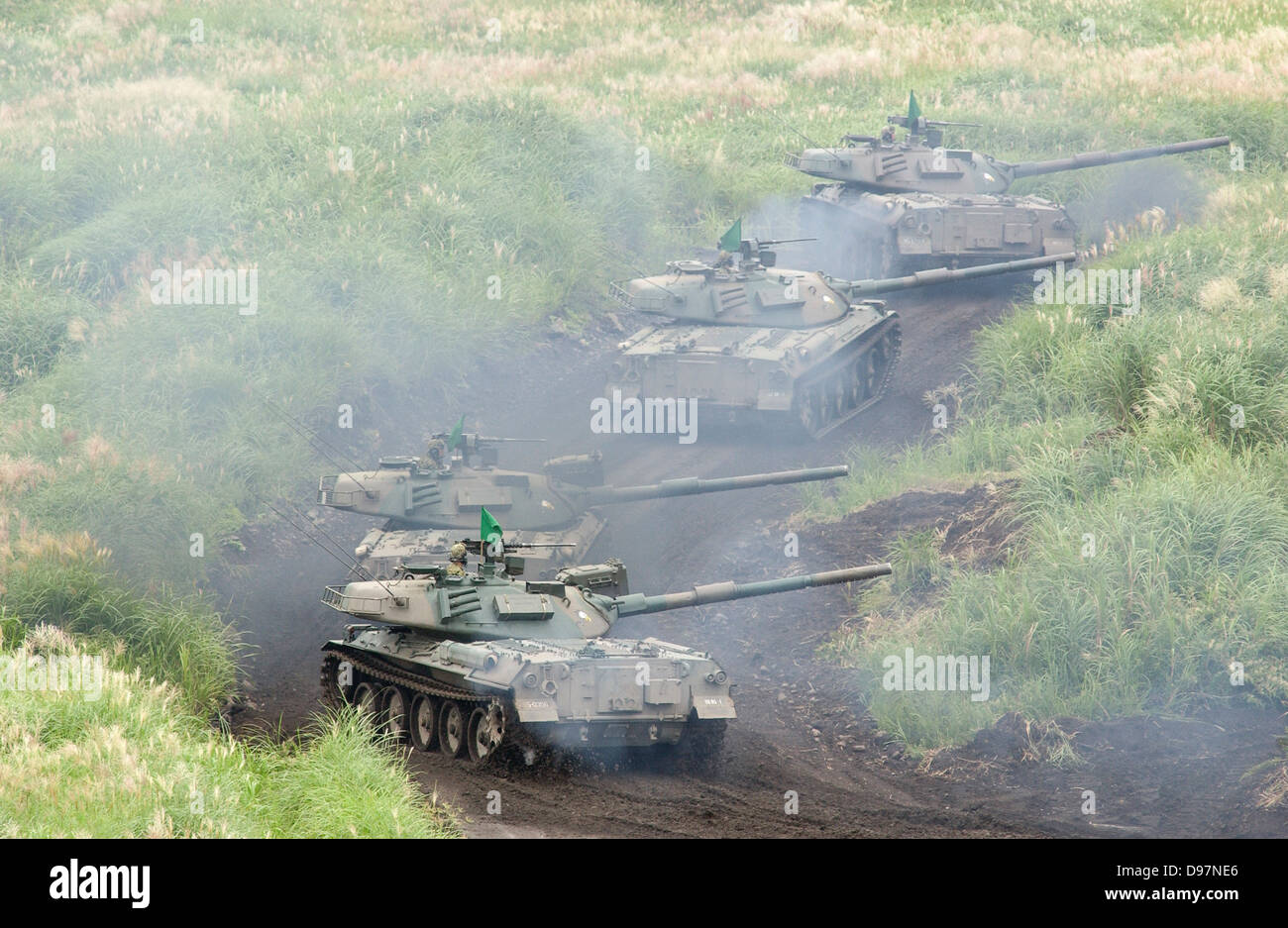 Japan Ground Self-Defense Forces (GSDF) take part in a live fire ...