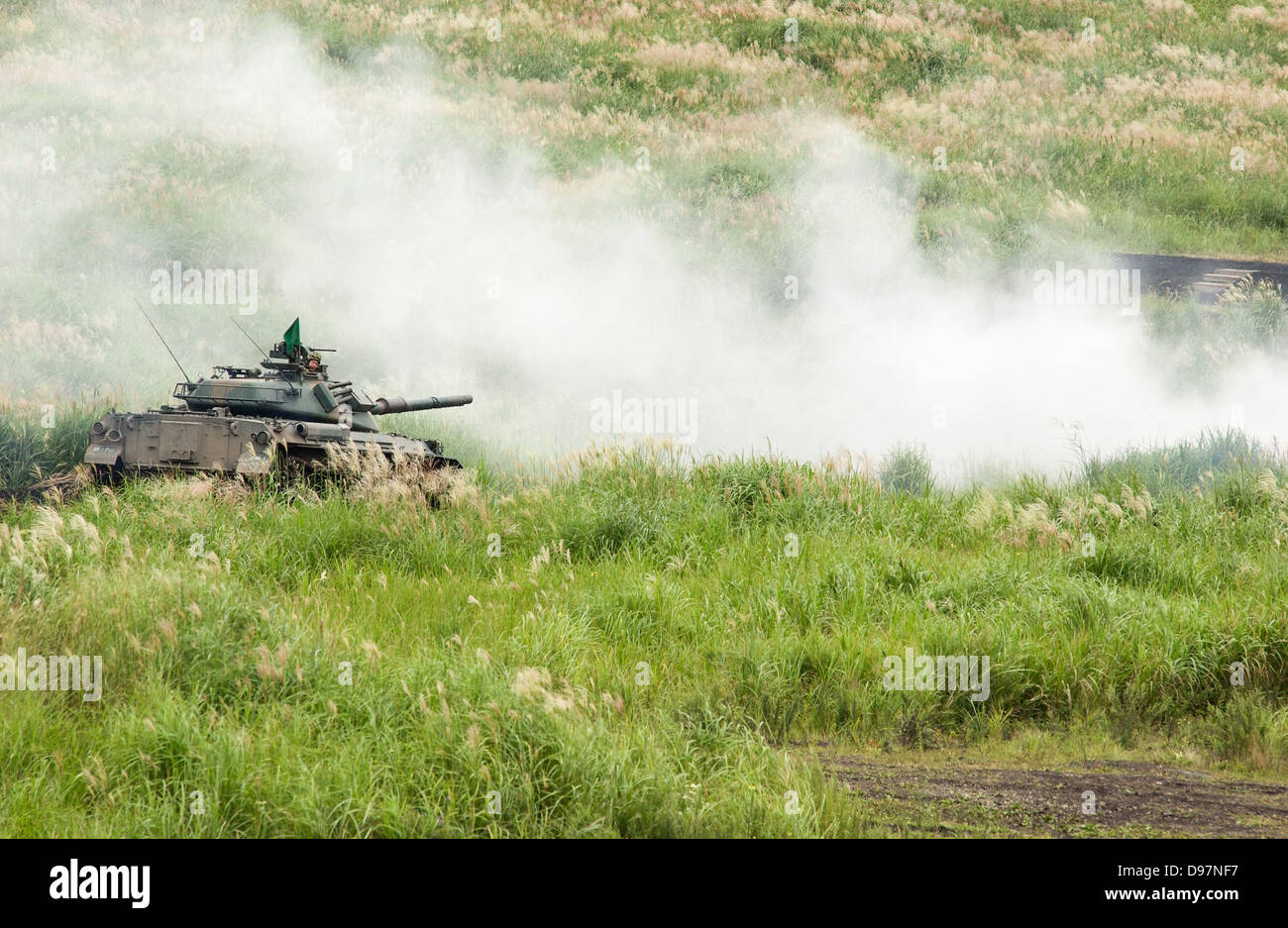 Japan Ground Self-Defense Forces (GSDF) take part in a live fire ...